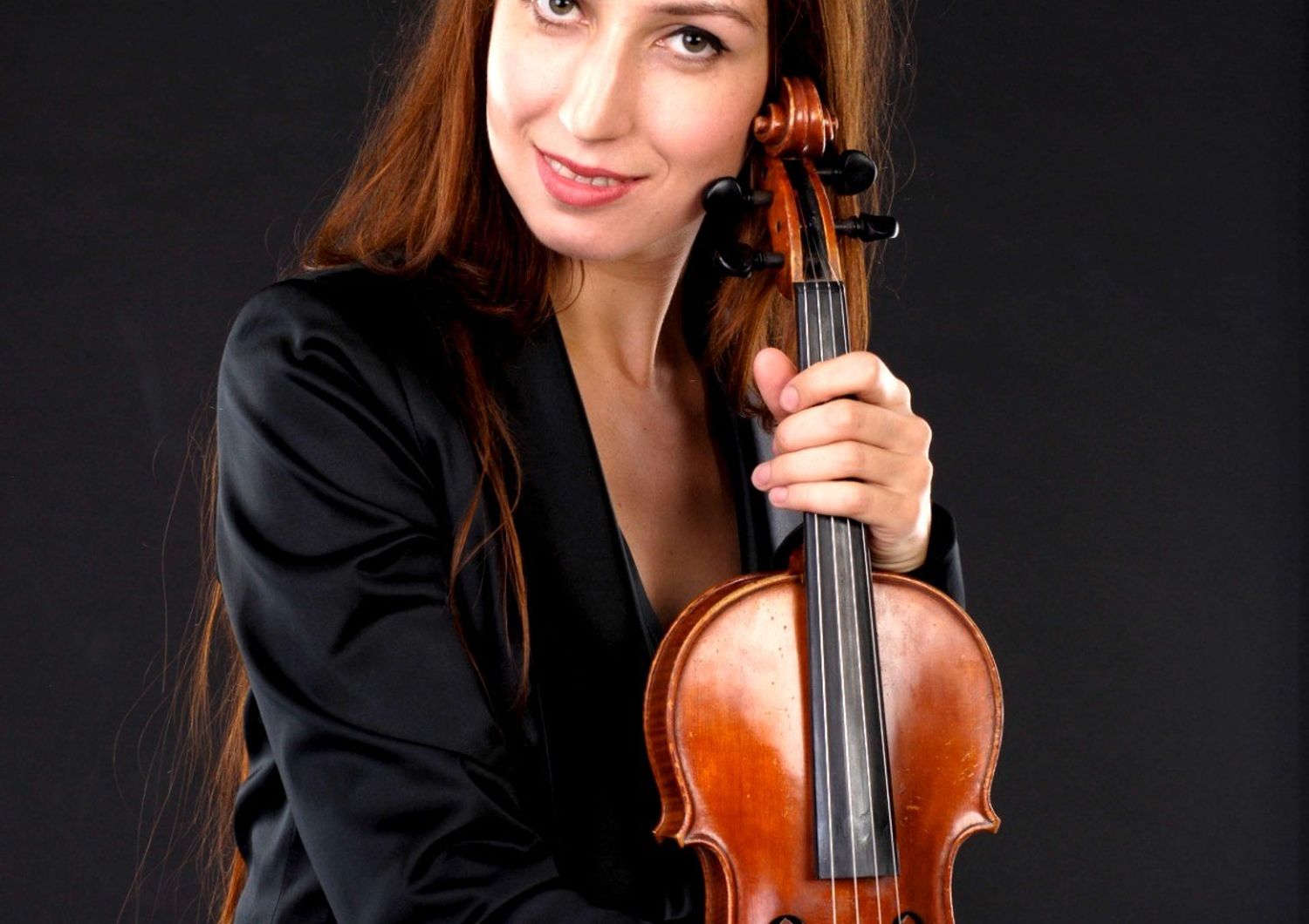 La violinista che suonava sotto le bombe di Kharkiv si esibirà nei ...